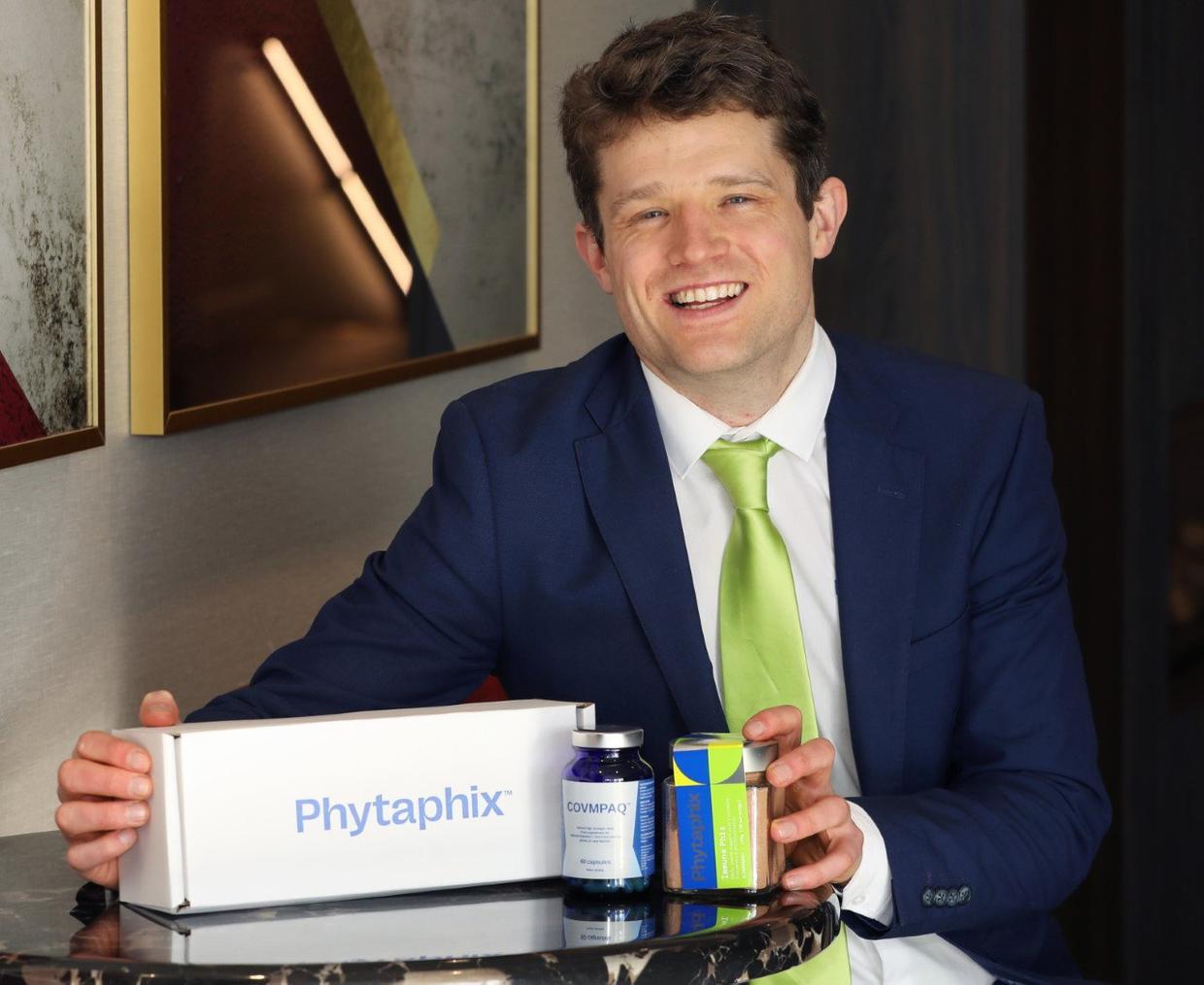 Dr Conor Kerley flying Louth flag at National Enterprise awards - Phyt